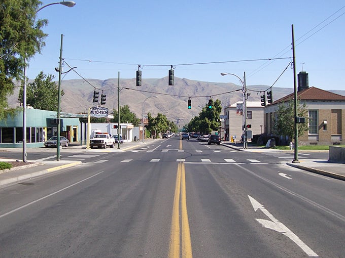 Main Street stretches toward rolling hills that embrace Clarkston like a grandmother's hug – comfortable, familiar, and surprisingly beautiful when you take the time to notice.