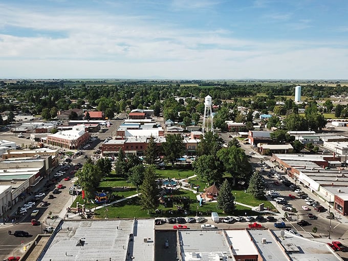 Burley's town square looks like it was designed by someone who actually understands what community means – trees, gathering spaces, and that iconic water tower watching over it all.