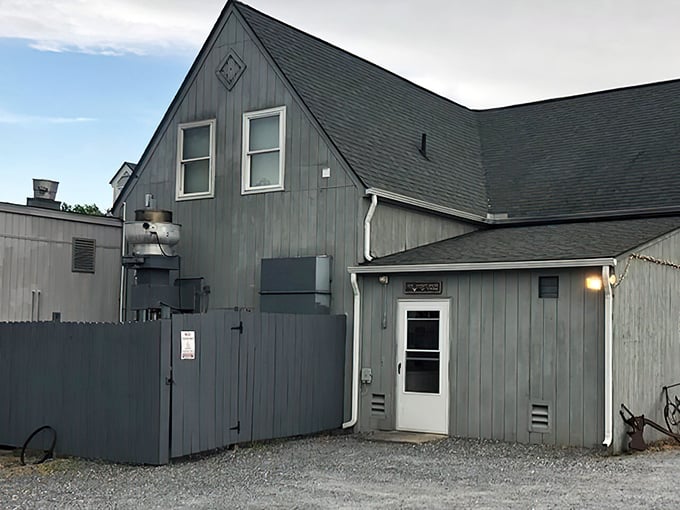 Don't let the unassuming gray exterior fool you—this culinary fortress houses some of Virginia's most magnificent steaks, proving great flavors often hide in plain sight.