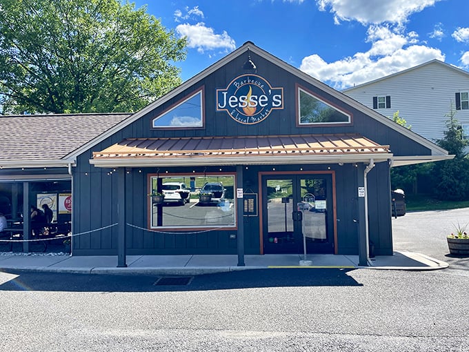 This charming dark-sided building promises smoky treasures within – and that sign never lies about pig butts.