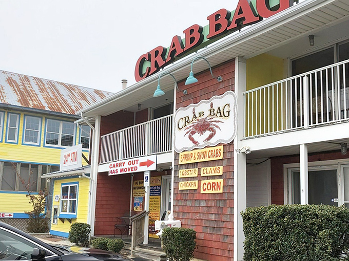 The red cedar-shingled exterior of The Crab Bag stands like a beacon of seafood salvation on Coastal Highway, promising treasures of the Chesapeake within.