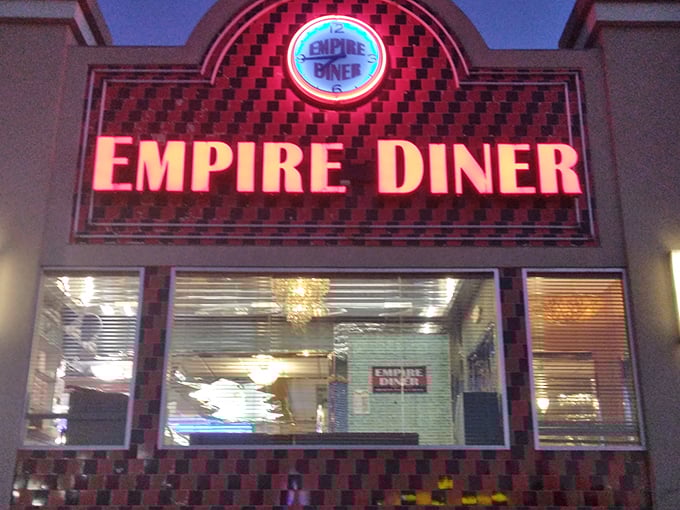 The New Empire Diner stands proud with its classic American architecture, bold red awnings that practically screams "good food happens here!"