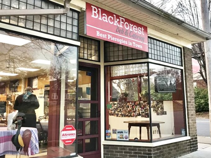 The unassuming storefront of Black Forest Deli promises culinary treasures within. That red sign isn't kidding about those pierogies – they're the real deal!