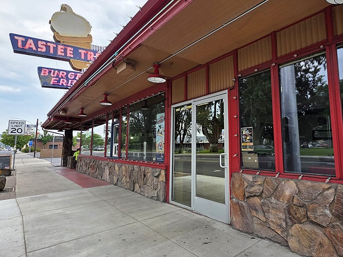 The iconic Tastee Treet sign beckons hungry travelers like a neon lighthouse in a sea of chain restaurants. Classic Americana at its finest.