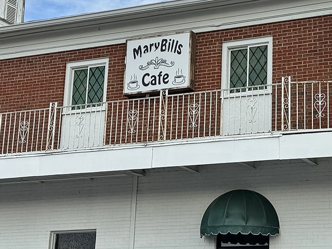 The charming brick exterior of MaryBill's Cafe, with its distinctive balcony and simple sign, promises culinary treasures within. No Instagram filters needed here—just honest-to-goodness good food.
