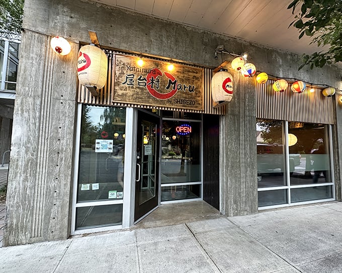 The glowing lanterns outside Yataimura Maru aren't just decoration—they're beacons calling hungry Portlanders to this slice of Tokyo tucked into the Pacific Northwest.