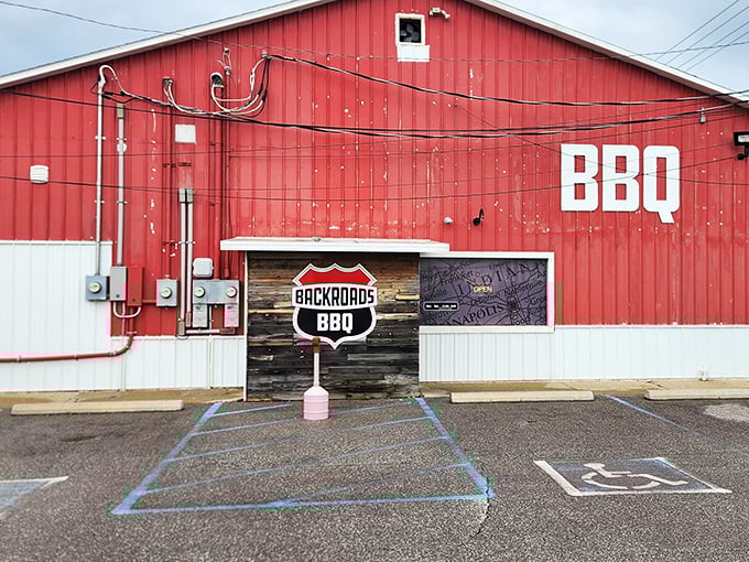 The bright red barn exterior isn't hiding horses – it's housing some of Indiana's most mouthwatering smoked meats. BBQ paradise found!