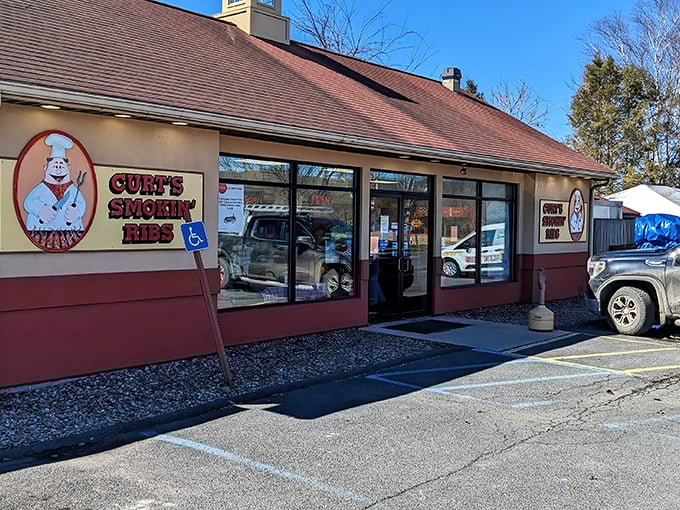 The unassuming exterior of Curt's Smokin' Ribs proves once again that BBQ brilliance often hides in plain sight. That cartoon chef knows what's coming!