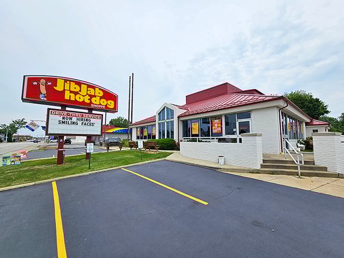 The iconic red-roofed Jib Jab beckons hungry travelers with its cheerful signage. Like a lighthouse for the famished, it promises simple pleasures done exceptionally well.