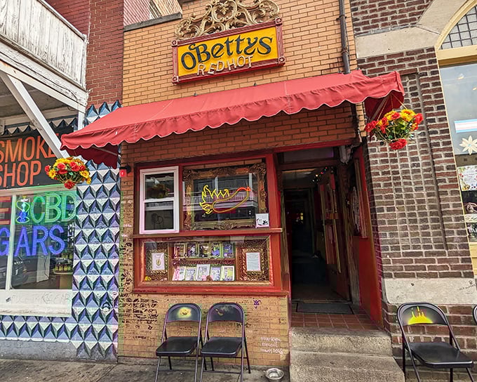 That iconic red awning and bright yellow sign create the perfect first impression—like the opening credits to your favorite food show that's about to deliver pure joy.