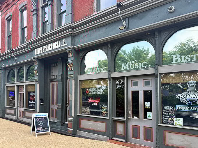 The historic façade of Ninth Street Deli beckons like an old friend, its arched windows and brick exterior promising culinary treasures within St. Louis's vibrant food scene.