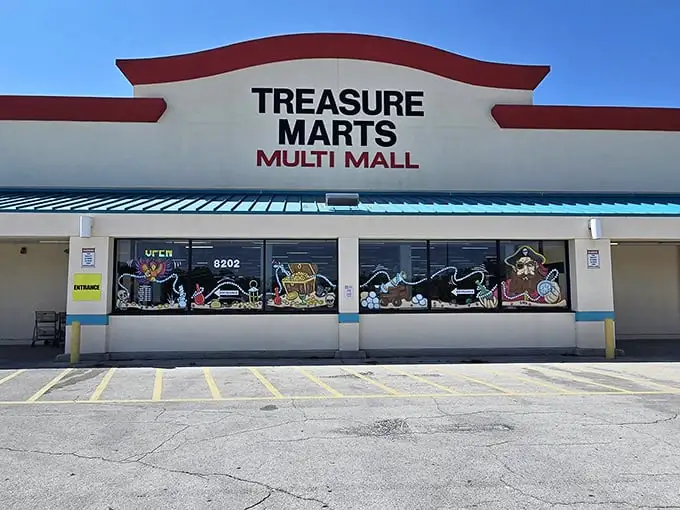 The iconic red-trimmed facade of Treasure Marts beckons bargain hunters like a siren call to the wallet-conscious adventurer.
