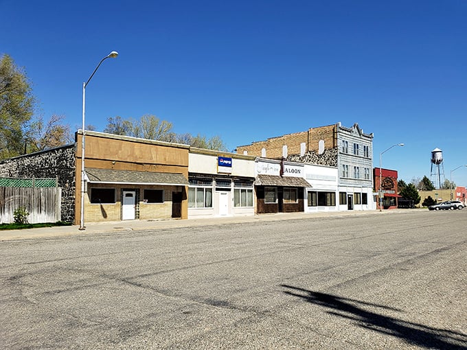 Main Street Shoshone – where time slows down and historic buildings stand proudly against that impossibly blue Idaho sky, like sentinels guarding small-town tranquility.
