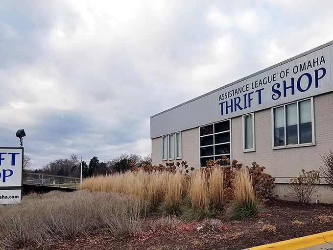 The unassuming exterior of bargain paradise – where Nebraska's savviest shoppers find treasures hiding in plain sight beneath those cloudy Omaha skies.