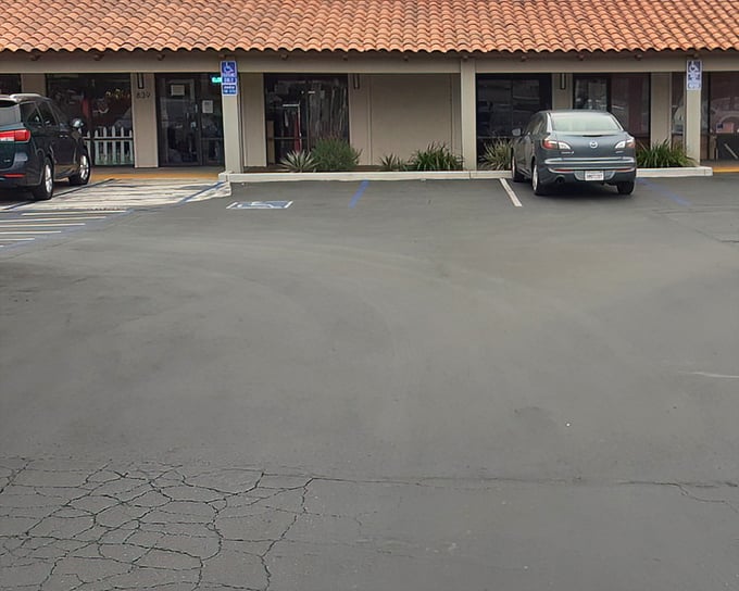 The unassuming exterior with its terra cotta roof might not scream "retail paradise," but inside awaits a treasure hunter's dream worth every second of exploration.