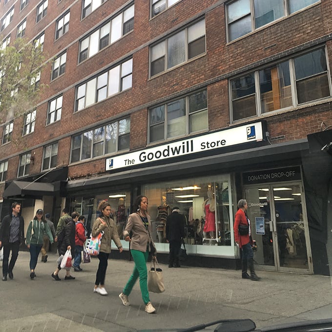The unassuming storefront of Goodwill on 14th Street – where Manhattan's fashion dreams get their second act and your wallet gets a standing ovation.