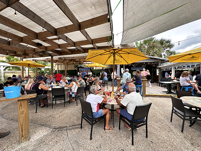 The yellow facade of Pop's Sunset Grill might not scream "culinary destination," but locals know this unassuming exterior hides seafood treasures within.