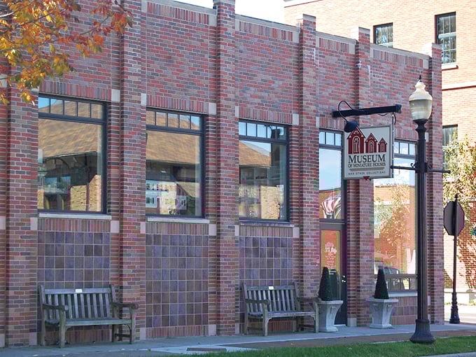The unassuming brick exterior of Carmel's Museum of Miniature Houses proves that sometimes the most magical worlds come in the most ordinary packages.
