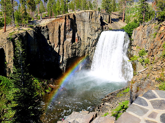 Nature's special effects department outdid itself here – Rainbow Falls lives up to its name with that perfect arc of color against rugged volcanic cliffs.