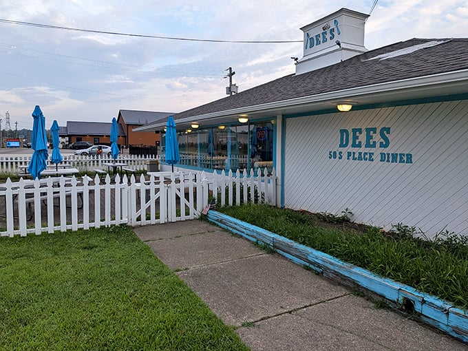 The classic white picket fence and cheerful blue trim announce you've found a genuine slice of Americana in Barberton.