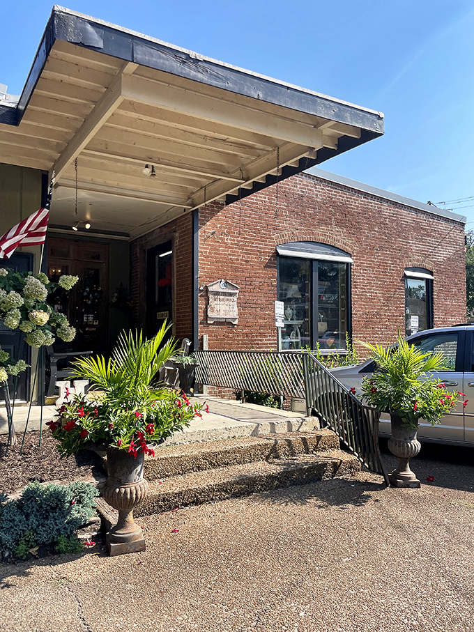 Brick, blooms, and a bit of Southern charm – this entrance has been welcoming treasure hunters since 1972, proving good taste never goes out of style.