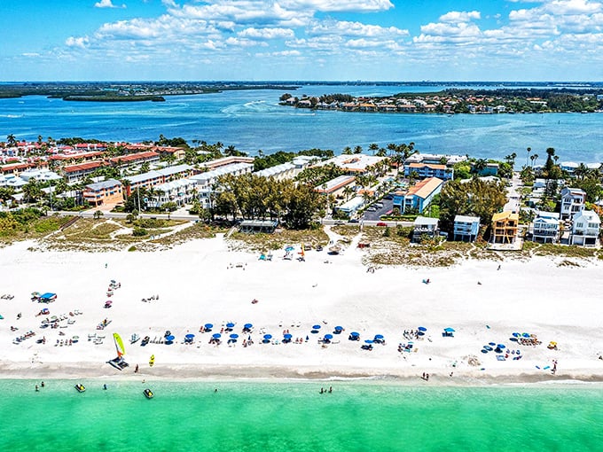 Anna Maria Island from above – where turquoise waters meet powdery white sand, creating a postcard-perfect scene that screams "retirement goals achieved!"