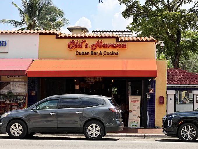 The sunshine-yellow façade of Old's Havana stands like a beacon on Calle Ocho, promising Cuban delights that would make your abuela proud.