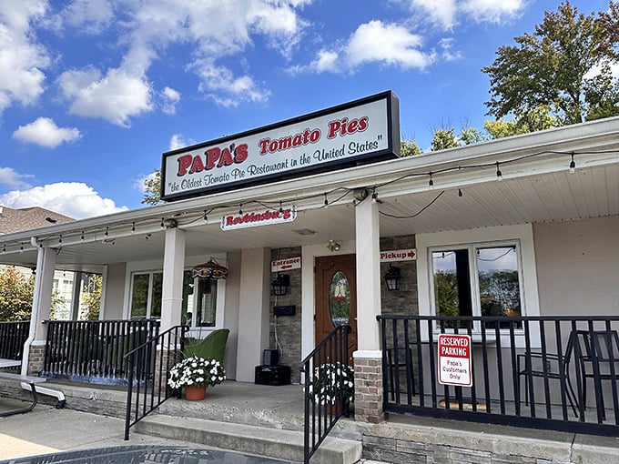 Bathed in New Jersey sunshine, this modest exterior belies the culinary treasures within. The "Oldest Tomato Pie Restaurant" claim isn't just marketing—it's documented history.
