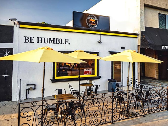The bright yellow umbrellas and bold "BE HUMBLE" signage aren't just eye-catching—they're your beacon to Nashville-style chicken nirvana in North Hollywood.