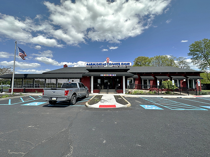The red exterior of Marblehead Chowder House stands like a beacon for seafood lovers, promising New England flavors with Jersey hospitality under those magnificent blue skies.
