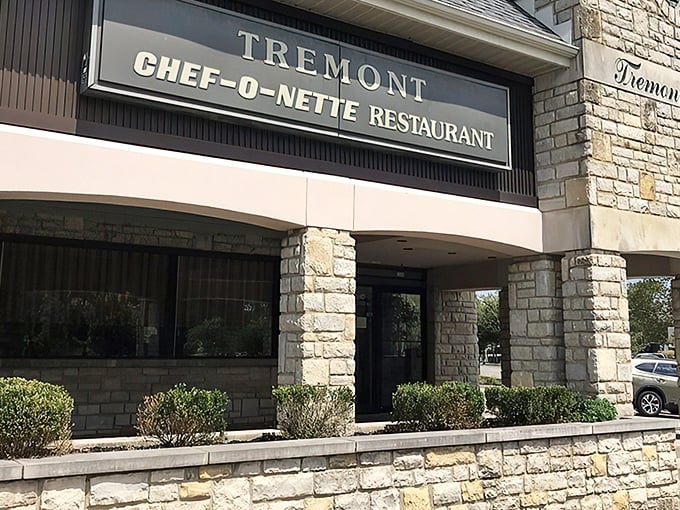 The stone facade of Chef-O-Nette stands like a culinary time capsule in Upper Arlington, welcoming hungry patrons just as it has for generations.