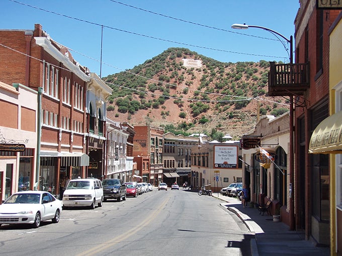 The historic district welcomes visitors with desert flora that perfectly frames Bisbee's promise of adventure – established long before your smartphone needed charging.