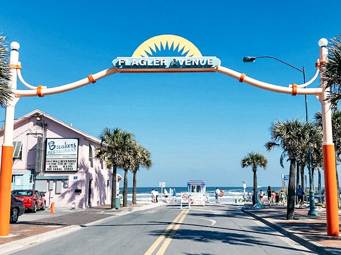 Beachfront bliss where palm trees stand guard and the pink building serves as a landmark for locals saying, "Turn at the pink place and you'll find us."