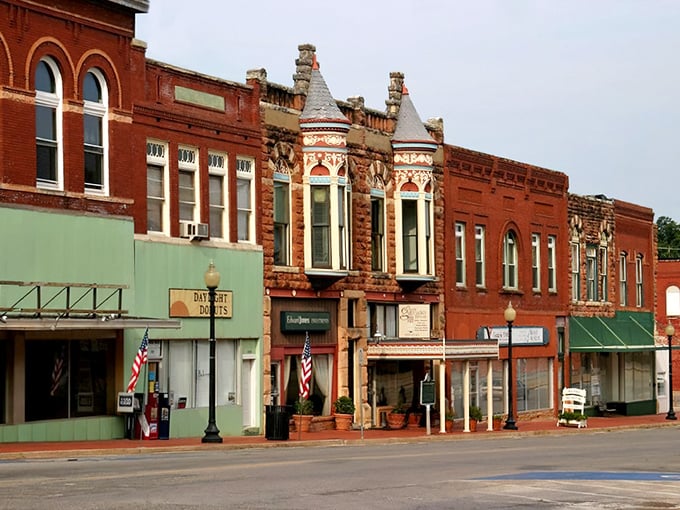 Those Victorian storefronts aren't just pretty faces – they're time machines disguised as buildings, complete with original brickwork.