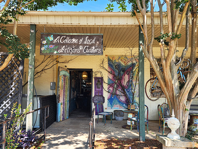The entrance says it all: "A Collection of Local Artisans & Curators." Like a butterfly-adorned portal to vintage wonderland, this façade promises treasures within.
