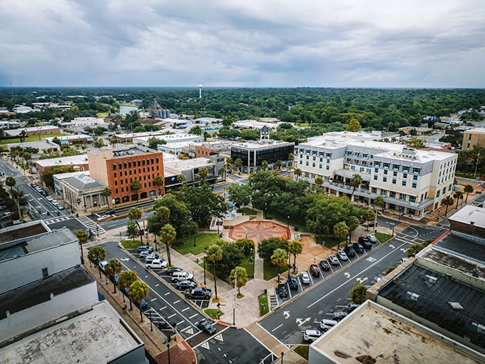 Downtown Ocala from above – where charming brick buildings meet lush greenery, and your retirement dollars stretch further than your morning yoga class.
