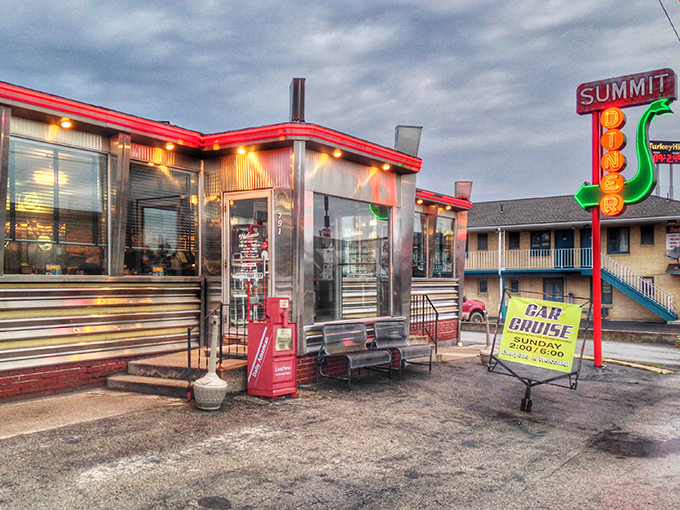 Twilight transforms the Summit Diner into a glowing time capsule, where the promise of comfort food awaits behind those gleaming metal walls.