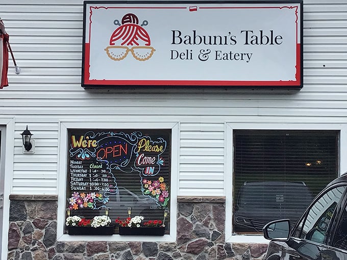 That colorful window display isn't just inviting you in—it's practically pulling you by the taste buds. The Polish flag stands guard over deliciousness.