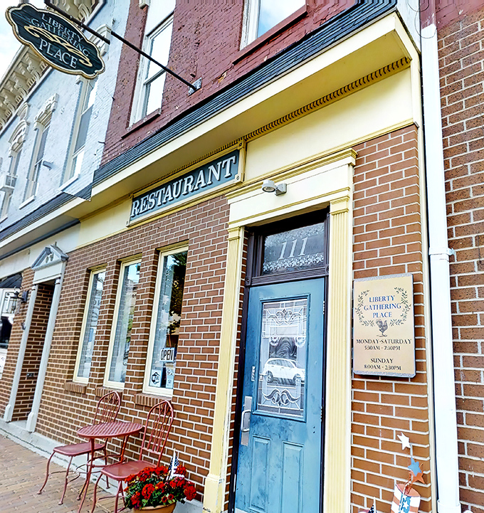 The classic brick façade with its vintage "RESTAURANT" sign and blue door isn't trying to be trendy—it's something better: genuinely timeless.