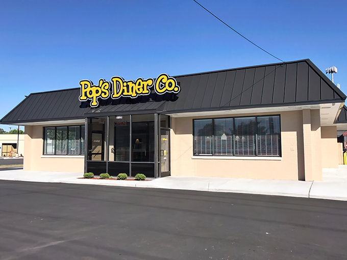 The cheerful yellow sign of Pop's Diner Co. stands out like a beacon of breakfast hope against Virginia Beach's blue sky. Simplicity never looked so inviting.