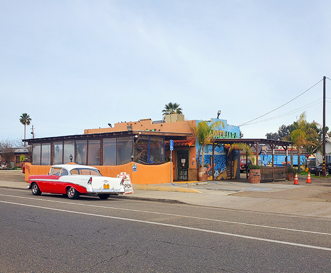 That vibrant orange and blue exterior isn't trying to be subtle, and frankly, neither is the food waiting inside.