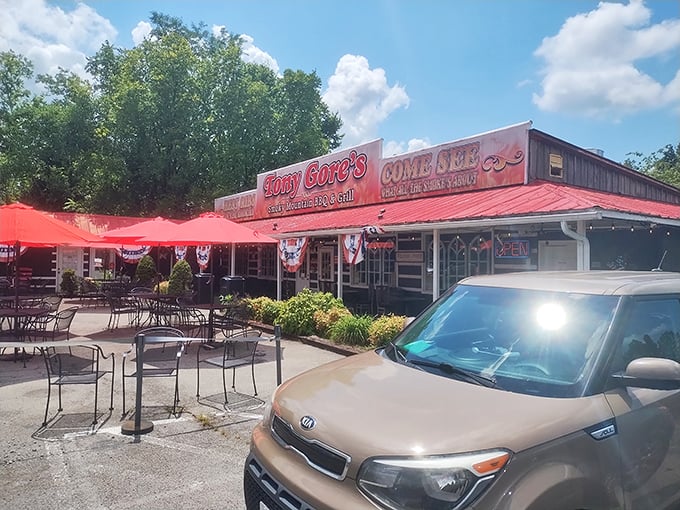 The iconic red roof of Tony Gore's beckons hungry travelers like a BBQ lighthouse on the Sevierville horizon. Southern hospitality starts at the curb.