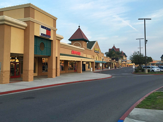 The Mediterranean-inspired architecture of Tulare Outlets welcomes bargain hunters with its distinctive turrets and covered walkways—retail therapy with a touch of California elegance.