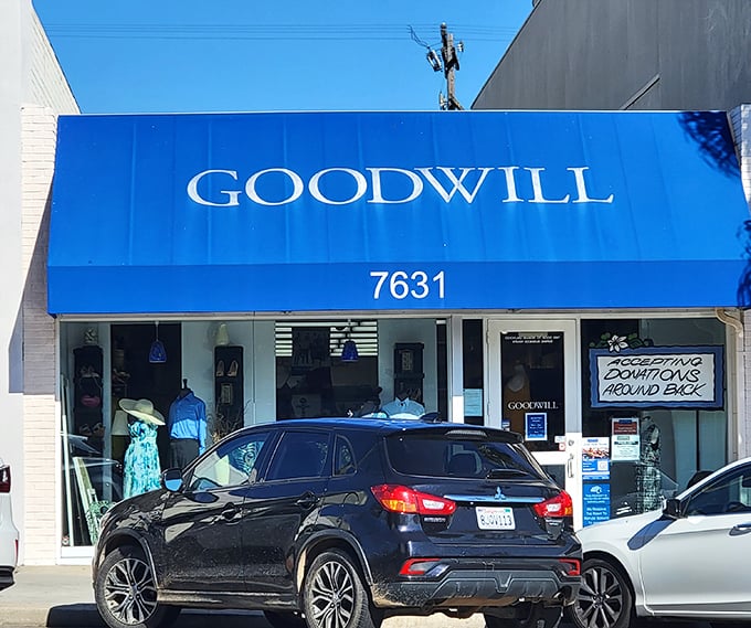 The iconic blue awning of La Jolla's Goodwill beckons like a beacon for bargain hunters – where coastal California's castoffs become your next conversation piece.