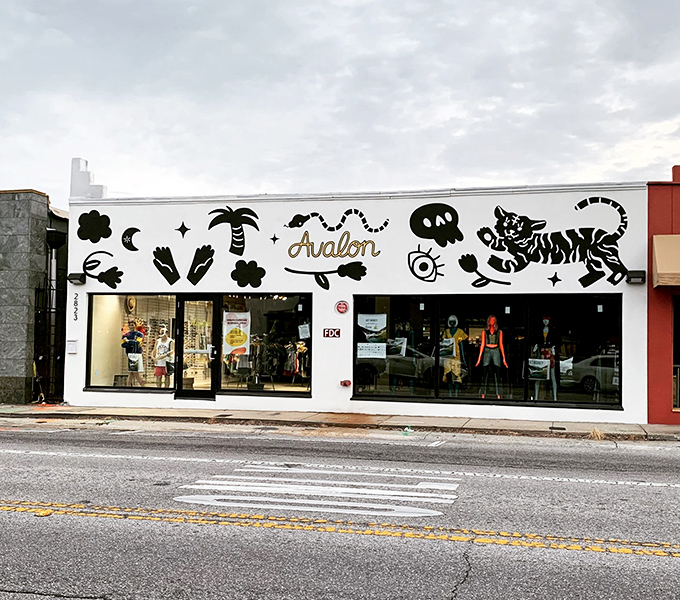 That playful mural with the striped tiger isn't just decoration – it's your first hint that this isn't ordinary thrift shopping.