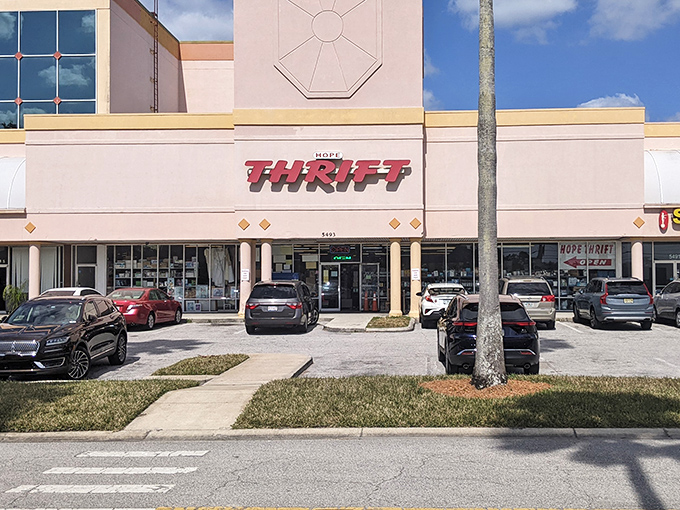 Parked cars line up like eager shoppers waiting their turn at this thrifting mecca. Behind that modest façade lies a universe where yesterday's castoffs become tomorrow's conversation pieces.