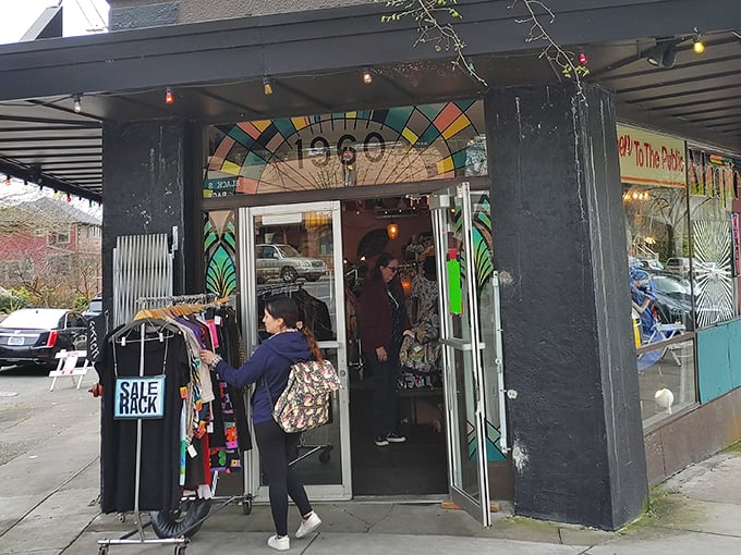The black facade with its colorful stained glass "1960" sign isn't just a storefront—it's a time portal waiting to transport you to fashion's greatest hits.