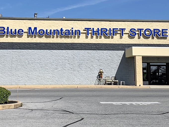 The unassuming exterior of Blue Mountain Thrift Store – where retail magic happens behind a modest façade. Like a poker player with a royal flush, it keeps its treasures hidden until you step inside.
