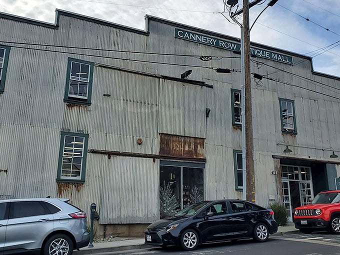 The weathered corrugated metal exterior isn't just industrial chic—it's authentic Monterey history, a sardine cannery reborn as a treasure hunter's paradise.
