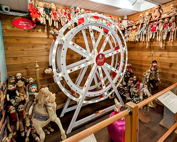 The Ferris wheel isn't just for humans! These sock monkeys enjoy their own carnival ride against rustic wooden walls that make you feel instantly nostalgic.